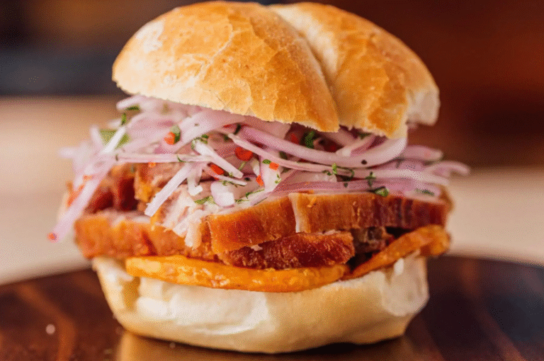 Irresistible Peruvian Chicharrón Sandwich: Epic Crunch 🔥